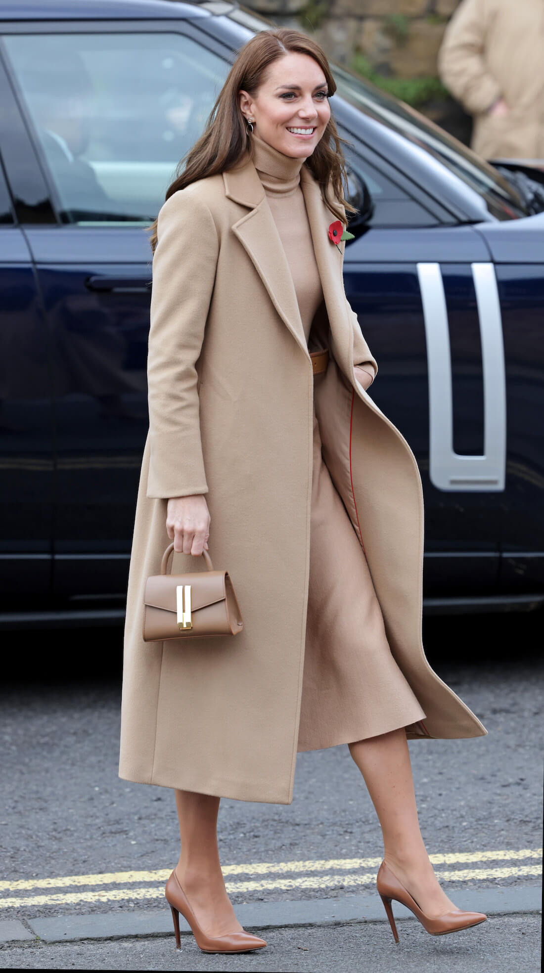 Daar is ze weer: Máxima in fabulous outfit terug aan 't werk